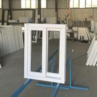 China Modern Double Panel PVC Vinyl Sliding Glass Window With Grilled Design and UPVC Horizontal Opening Design Fiberglass Netting for sale