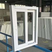 China Modern Double Panel PVC Vinyl Sliding Glass Window With Grilled Design and UPVC Horizontal Opening Design Fiberglass Netting for sale