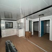 China 20ft 40ft Prefab Mobile 3-in-1 Foldable Container House with Two Room One Hall Layout - Grade 11 Wind Resistance for sale