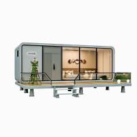 China Prefabricated Apple Cabin House with Metal Carved Panel Exterior Wall and Electrical System for sale