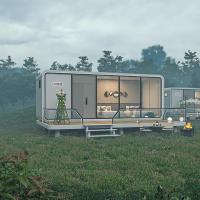 China Prefabricated Apple Cabin House with Metal Carved Panel Exterior Wall and Electrical System for sale