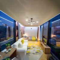 China Prefabricated Apple Cabin House with Metal Carved Panel Exterior Wall and Electrical System for sale