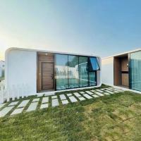 China Prefabricated Apple Cabin House with Metal Carved Panel Exterior Wall and Electrical System for sale