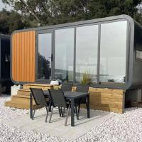 China Customizable Apple House Container Building 3500x8000mm with Rock Wool Insulation for Coffee Shop & Leisure Cottage for sale