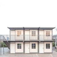 China Flat Pack Container House Pre-Wired with Electricity 50mm EPS Wall Panel for Quick Installation for sale