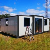 China Expandable Container House 50mm Rock Wool Sandwich Panel Steel Frame Grade 11 Wind Resistance for sale