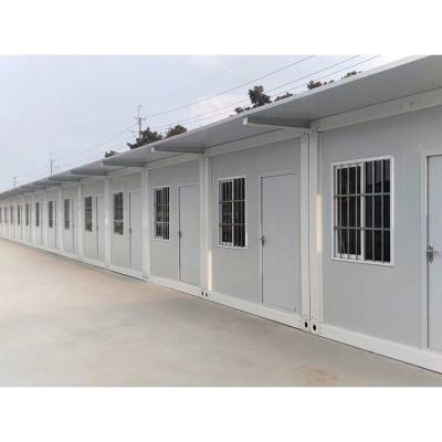 China Flat Pack Container House 50mm EPS Sandwich Panel Prefab Home with MGO Floor for sale