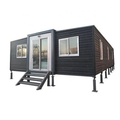 China Expandable Container House with Durable Steel Frame and Rock Wool Sandwich Panel for sale