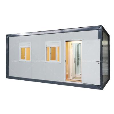 China Cost Effective Labor Saving Flat Pack Container House Prefab Buildings Mini Warehouse for sale