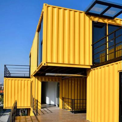 China Flat Pack Container House 50mm Insulated Fireproof Wall Roof Panel Portable Living Space for sale