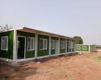 China Detachable Container House 50mm Rock Wool Sandwich Panel Aluminum Alloy Door Prewired for sale