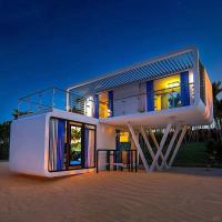 China Modern Capsule Apple Cabin Luxury Prefab House 20ft 40ft Modular Steel Cabin for sale