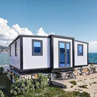 China Expandable Container House Steel Frame 50mm EPS Sandwich Panel Prefab Living Space for sale