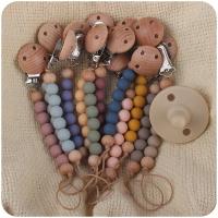 China Wooden Bead Pacifier Chain Clip Soothe Baby Silicone Beads Anti Drop Pacifier Chain for sale