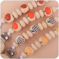 China Geometric Silicone Pacifier Chain Clip Wooden Pacifier Holder for sale
