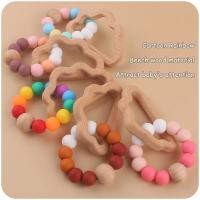 China Eco- Friendly Handmade Crochet baby Pacifier Clips Chain Wholesale Best price Colored chain teether wood clip for sale