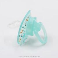 China 2020 best sell factory price cBPA free plastic baby pacifier with ring and silicone flat nipple for sale