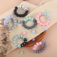 China Bpa Free Natural Rubber Silicone Pacifier  Baby Letter Chew Teething Teether Toy for sale