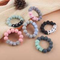 China Bpa Free Natural Rubber Silicone Pacifier  Baby Letter Chew Teething Teether Toy for sale