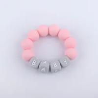China Bpa Free Natural Rubber Silicone Pacifier  Baby Letter Chew Teething Teether Toy for sale