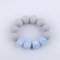 China Bpa Free Natural Rubber Silicone Pacifier  Baby Letter Chew Teething Teether Toy for sale