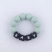 China Bpa Free Natural Rubber Silicone Pacifier  Baby Letter Chew Teething Teether Toy for sale