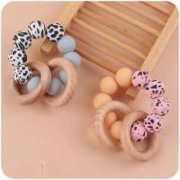 China BPA Free Silicone Beach Ring Baby Toy Teether Wholesale Wooden Baby Silicone Teethers for sale