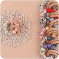 China BPA Free Silicone Beach Ring Baby Toy Teether Wholesale Wooden Baby Silicone Teethers for sale