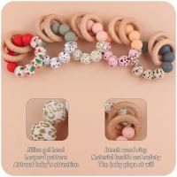 China BPA Free Silicone Beach Ring Baby Toy Teether Wholesale Wooden Baby Silicone Teethers for sale