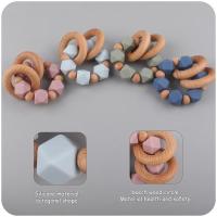 China Baby Teething Toys Rattle Soft Bpa Free Cartoon Wood Baby Teether Ring Kids Food Grade Baby Silicone Teether for sale