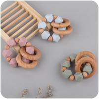 China Baby Teething Toys Rattle Soft Bpa Free Cartoon Wood Baby Teether Ring Kids Food Grade Baby Silicone Teether for sale