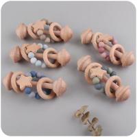 China Beech Wooden Baby Rattle Shake Toy Wood Animal Teether Ring Grasping Teething Toys for sale