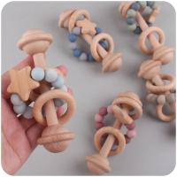 China Beech Wooden Baby Rattle Shake Toy Wood Animal Teether Ring Grasping Teething Toys for sale