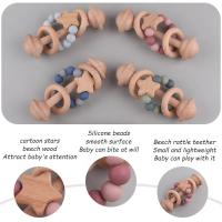 China Beech Wooden Baby Rattle Shake Toy Wood Animal Teether Ring Grasping Teething Toys for sale