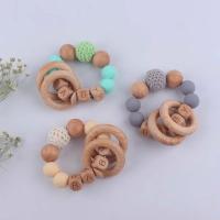 China Baby Teething Toys Rattle Soft Bpa Free Cartoon Wood Baby Teether Ring Kids Food Grade Baby Silicone Teether for sale