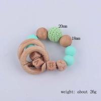 China Baby Teething Toys Rattle Soft Bpa Free Cartoon Wood Baby Teether Ring Kids Food Grade Baby Silicone Teether for sale