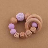 China Baby Teething Toys Rattle Soft Bpa Free Cartoon Wood Baby Teether Ring Kids Food Grade Baby Silicone Teether for sale