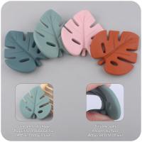 China Molar Infant Chew Toys Leaf Shape Food Grade Silicone Baby Teether for sale