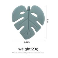 China Molar Infant Chew Toys Leaf Shape Food Grade Silicone Baby Teether for sale