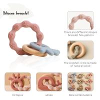 China BPA Free Infant Teething Toys Silicone Bracelet Pendant Wood Ring for sale