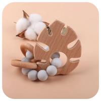 China Food Grade Silicone Teether Toy Rattle Soft BPA Free Cartoon Wood Teether Ring for sale