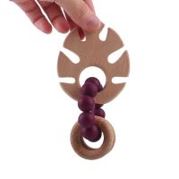 China Food Grade Silicone Teether Toy Rattle Soft BPA Free Cartoon Wood Teether Ring for sale