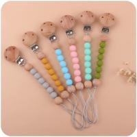 China Silicone Toothbrush Infant Teething Toys 4 Pieces Set Baby Pacifier Clips Teether for sale
