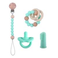 China Silicone Toothbrush Infant Teething Toys 4 Pieces Set Baby Pacifier Clips Teether for sale