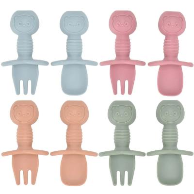 China Training Feeding Newborn Accessories Mini Soft Silicone Baby Spoon Fork Set for sale