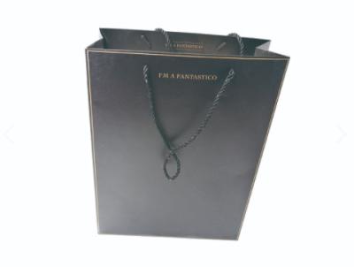 China Branded Gift Packing Bag For Clothes Paper Bag With Rope Handle for sale