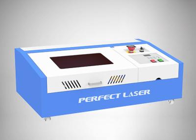 China CO2 40W Small Rubber Stamp Laser Engraving Machine With Working Area 300*200mm for sale