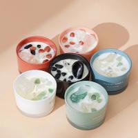 China Different Scents 65g Soy Wax Glass Jar Scented Candle With Stone for sale