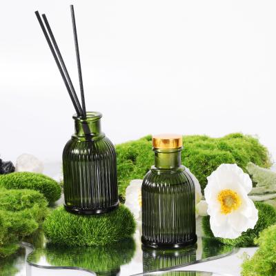 China Garden Fragrance Glass Bottle Reed Diffuser Private Label 100ml With Gold Metal Lid for sale