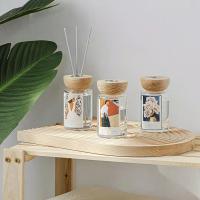 China Aromatherapy Essential Oil Fragrance Perfume Glass Bottle Reed Diffuser With Wooden Lid for sale